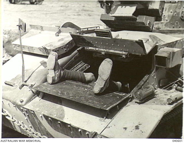 LIBYAN DESERT. 1941. REPAIRS TO THE "INNARDS". PERSONNEL OF THE ROYAL ...