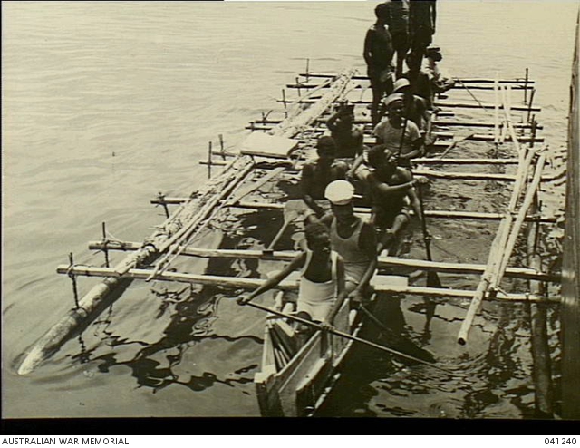 Los Negros Island, Admiralty Group. c. 1943. A group of natives in a ...