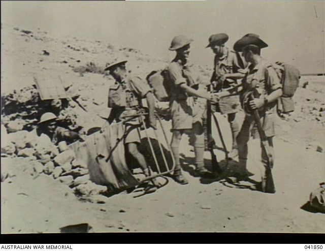 Tobruk, Libya. 1941-10-21. A relieving infantry section of the 9th ...