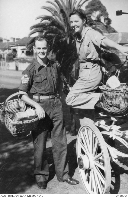 Irene (Rene) Harle dismounts from her horse drawn delivery cart with a ...