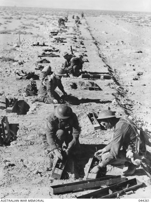 DERNA,LIBYA. 1941-01-30. AUSTRALIAN ENGINEERS REMOVING LAND MINES FROM ...