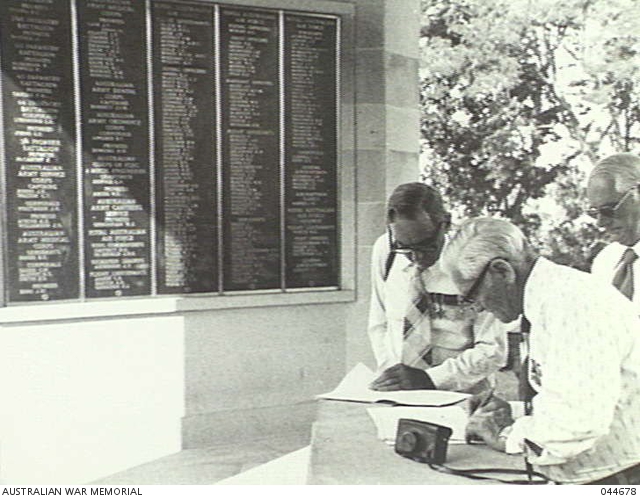 GULL FORCE VETERANS SIGNING THE VISITOR'S BOOK AT THE AMBON WAR ...
