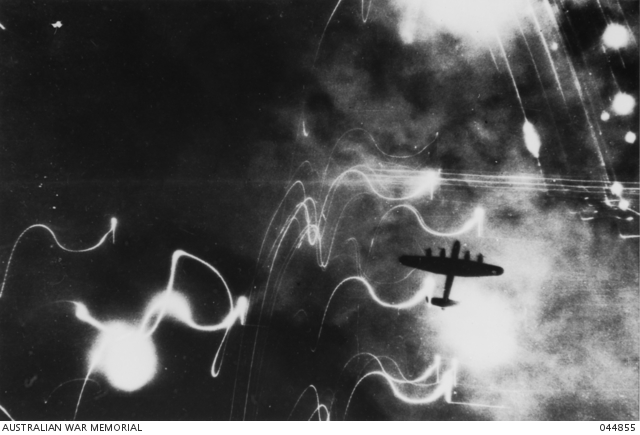 A NIGHT BOMBING RAID ON THE GERMAN CITY OF HAMBURG VIEWED FROM ABOVE. A ...