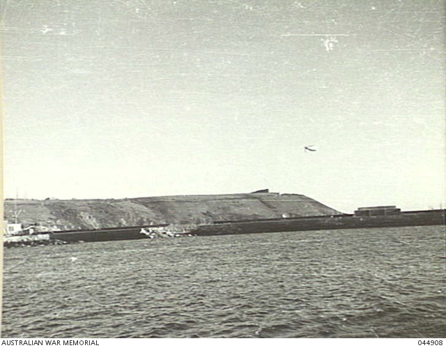 BOMB DAMAGE BY GERMAN AIRCRAFT TO THE SEA WALL AT MOUNT BATTEN ...