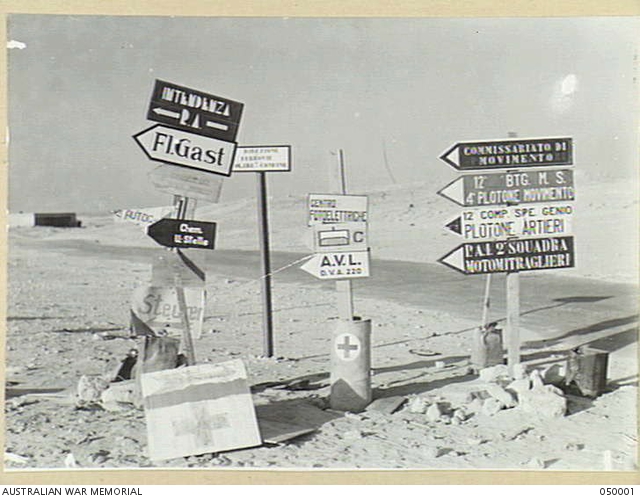 MERSA MATRUH, EGYPT. 1942-11. GERMAN AND ITALIAN ARMY SIGNBOARDS AT A ...