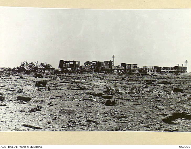 MERSA MATRUH, EGYPT. 1942-11. A WRECKED AMMUNITION TRAIN OUTSIDE MERSA ...