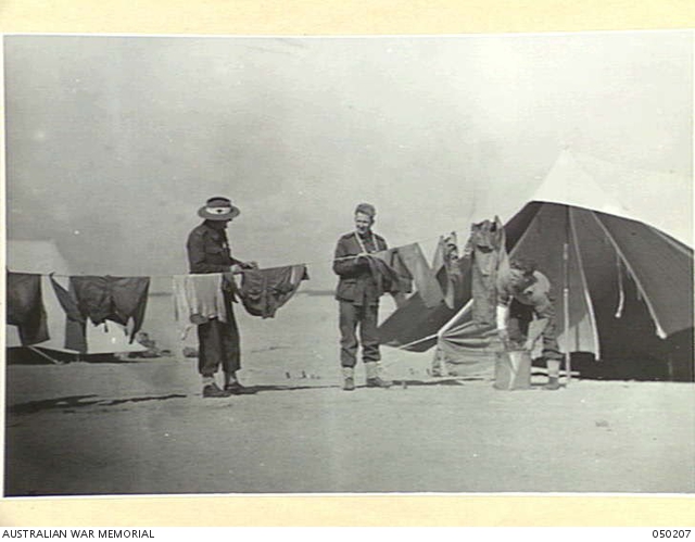 EL SHATT, SUEZ, EGYPT. 1943-01. WASHING DAY AT EL SHATT. WATER IS VERY ...