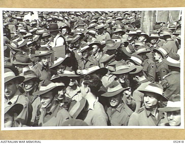 TROOPS CROWD THE BETTING RING, AT THE HORSE RACE MEETING ORGANISED BY ...