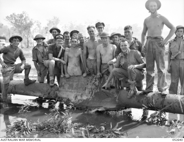 DARWIN AREA, NT. 1943-06-20. DAMAGE TO DARWIN'S WATER SUPPLY LINE AFTER ...