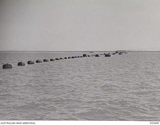 The anti submarine boom defence in Darwin Harbour. This is one of the ...