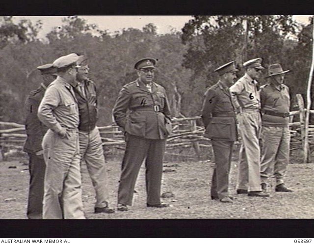 General Douglas MacArthur and the official party watching the 25 ...