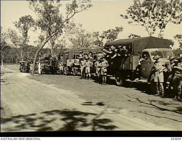 Berry Springs, NT. 1943-07-14. A convoy of some fifty trucks carrying ...