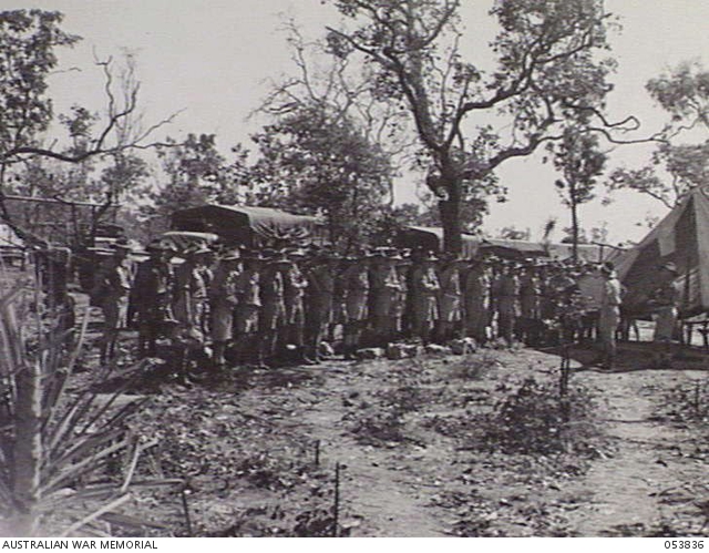 BERRY SPRINGS, NT. 1943-07-14. AFTER DEBUSSING, TROOPS RECEIVE ...