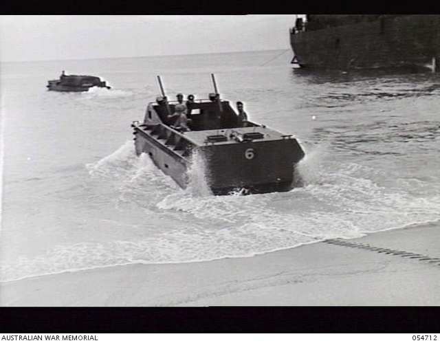 TRINITY BAY, QLD. 1943-07-27. "ALLIGATOR" AMPHIBIOUS TRACTOR, AT SEA ...