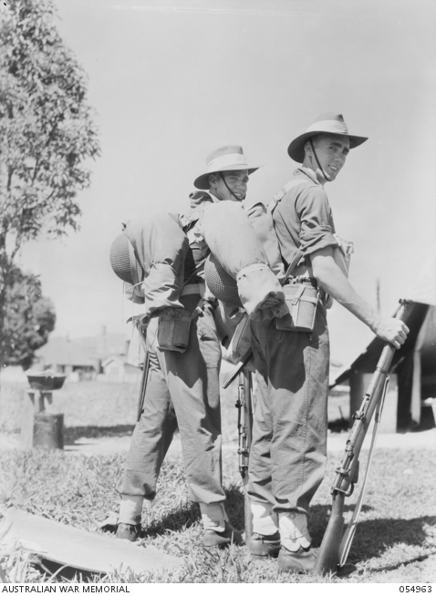 MALANDA, QLD, 1943-07-30. VX26525 CORPORAL T. C. STUCKEY (LEFT) AND ...
