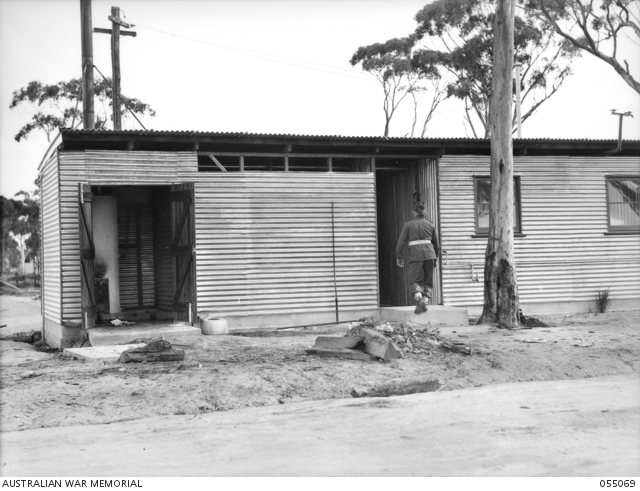 MERREDIN, WA. 1943-07-05. ABLUTION BLOCK AT THE 2/1ST AUSTRALIAN ...