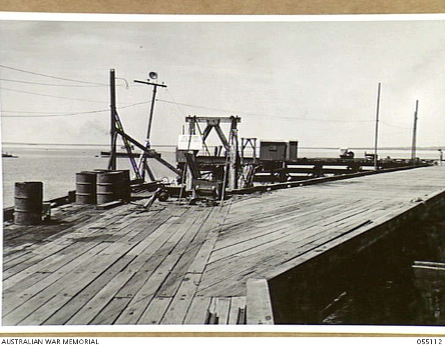 DARWIN, NT. 1943-08-08. MAIN JETTY AT DARWIN, PARTLY REPAIRED AFTER ...