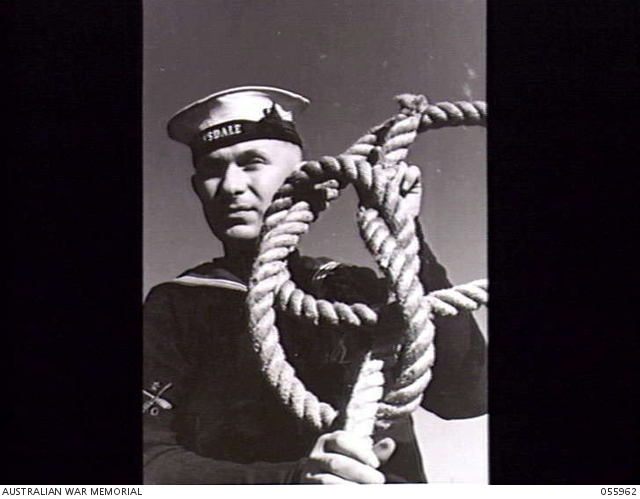 PORT MELBOURNE, VIC. 1943-08-25. NAVY INSTRUCTOR FROM HMAS LONSDALE ...