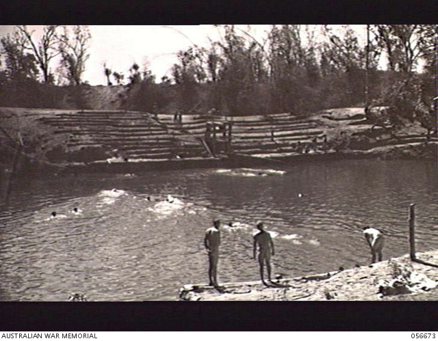 ADELAIDE RIVER, NT. 1943-08-25. SWIMMING POOL BUILT BY MEMBERS OF THE ...