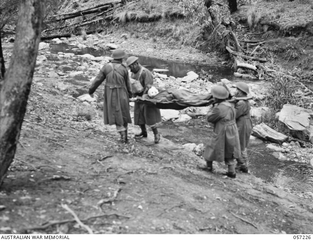DARLEY, VIC. 1943-09-29. STRETCHER BEARER SQUAD TRANSPORTING A PATIENT ...