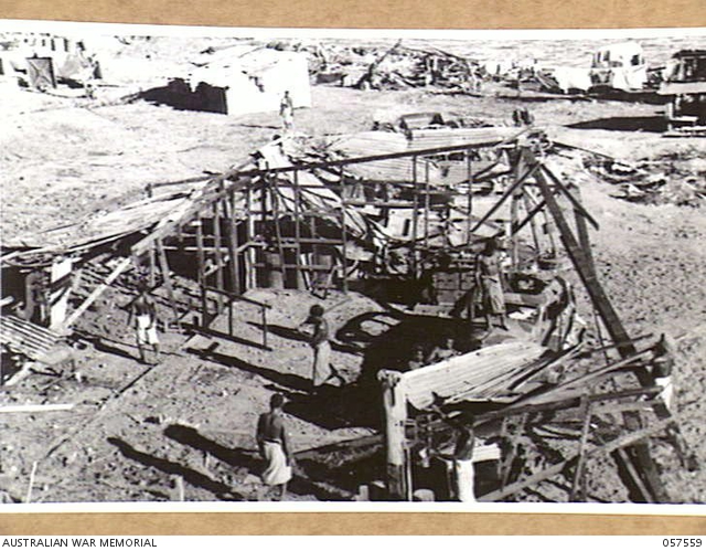 SALAMUA, NEW GUINEA. 1943-09-20. BOMB DAMAGED JAPANESE BUILDING ...
