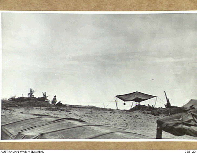 SALAMAUA, NEW GUINEA, 1943-09-26. CAPTURED JAPANESE GUN EMPLACEMENTS ON ...