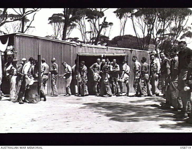 ARDATH AREA, WA. 1943-10-23. MESS PARADE OF THE 9TH AUSTRALIAN ADVANCED ...