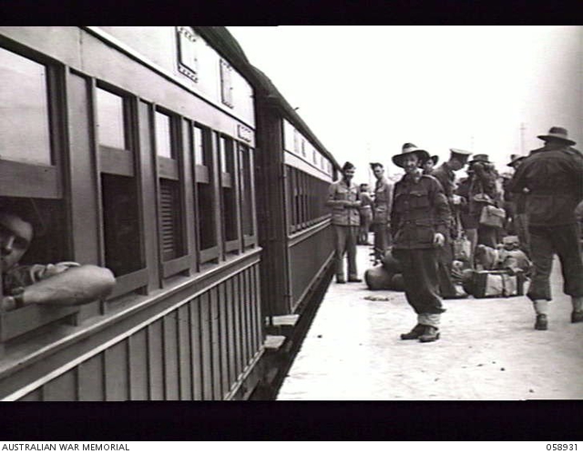 CLAPHAM JUNCTION, QLD. C. 1943-10-31. TROOPS DETRAINING AFTER ...