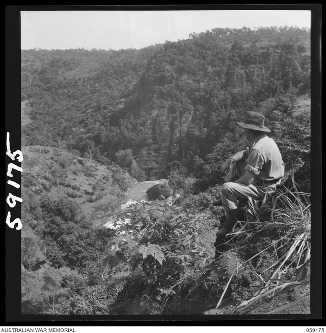 ROUNA FALLS, NEW GUINEA. 1943-11-05. WARRANT OFFICER 1 J. MURPHY OF THE ...