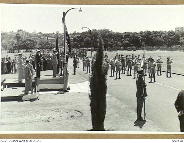 PERTH, WA. 1943-11-03. THE SLOW MARCH PAST THE SALUTING BASE, LED BY ...