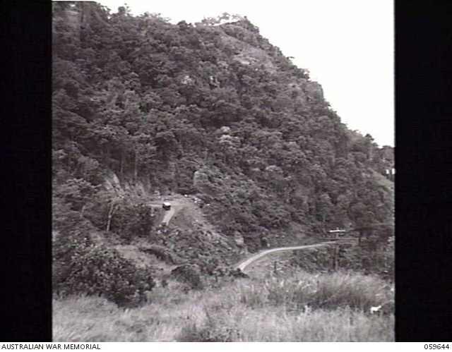 DONADABU, NEW GUINEA. 1943-11-07. VIEW OF THE ROUNA FALLS ROAD WINDING ...