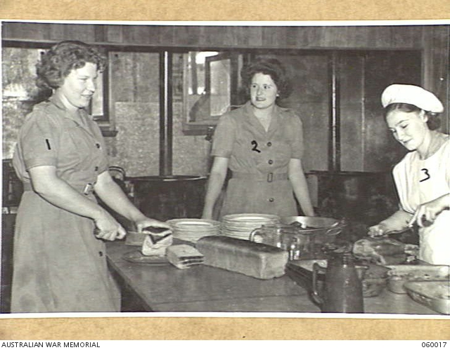 TOLGA, QLD. 1943-12-17. AUSTRALIAN WOMEN'S ARMY SERVICE COOKS PREPARING ...