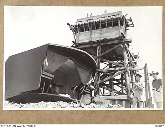 LYTTON, QLD. 1943-11-12. NEW TWIN 6-POUNDER EQUIPMENT BEING INSTALLED ...