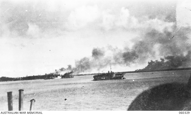 DARWIN, AUS. 1942-02-19. SHIPS BLAZING FURIOUSLY IN THE HARBOUR, DURING ...