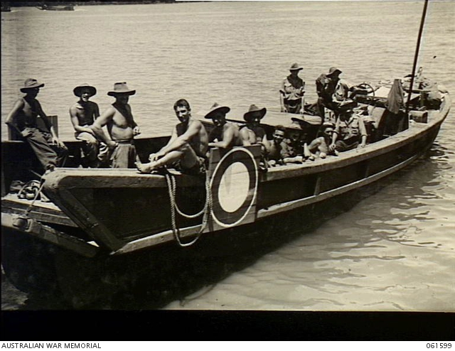Finschhafen, New Guinea. 1943-11-20. A captured Japanese barge being ...