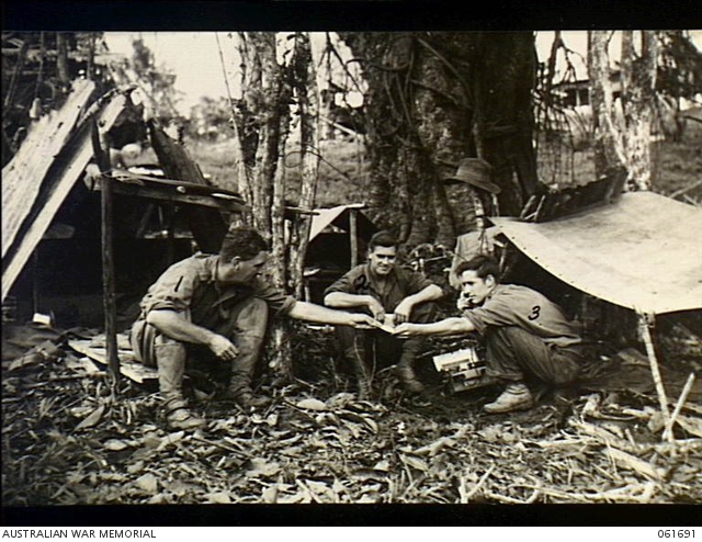 Wareo, New Guinea. 1943-12-09. Advanced Signals Section of the 2/23rd ...
