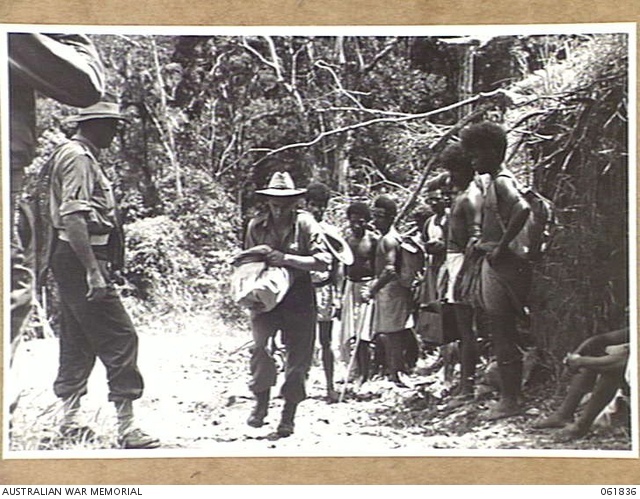 NATIVE CARRIERS BEING INSTRUCTED IN THE MOVEMENTS FOR THE TAKING OF ...