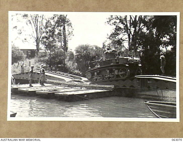 SOUTHPORT, QLD. 1944-01-13. A GENERAL STUART M3A1 TANK CROSSING A ...