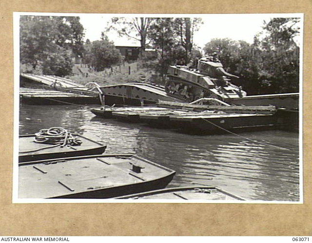 SOUTHPORT, QLD. 1944-01-13. A GENERAL STUART M3A1 TANK CROSSING A ...