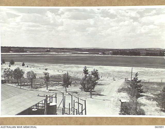 YANCO, NSW. 1944-01-22. VIEW FROM THE WATER TOWER SHOWING LAND UNDER ...