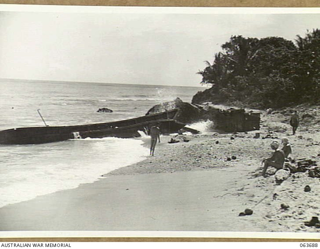 HUON PENINSULA, NEW GUINEA. 1944-01-14. TWO OF THE MANY WRECKED ...