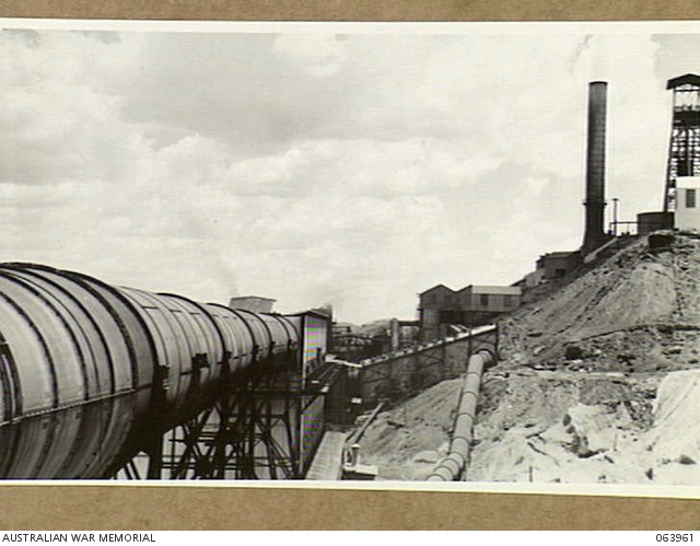 MOUNT ISA, QLD. 1944-01-24. MINEHEAD WINDING GEAR (EXTREME RIGHT) AND ...