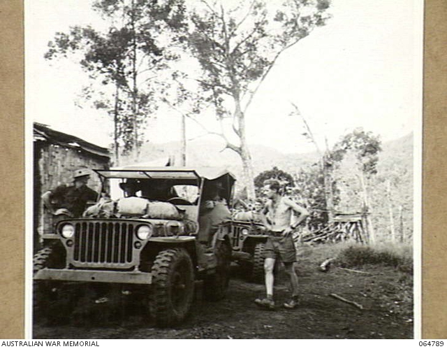 AN AUSTRALIAN ARMY JEEP ABOUT TO LEAVE OWERS' CORNER LOADED WITH THE ...