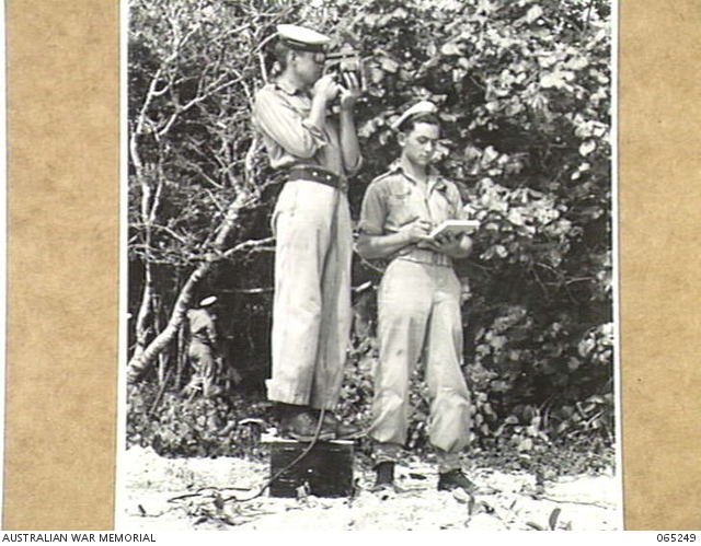 PORT DOUGLAS, QLD. 1944-03-17. SIGNALLER D.R. MOYLE (1) AND SIGNALLER P ...