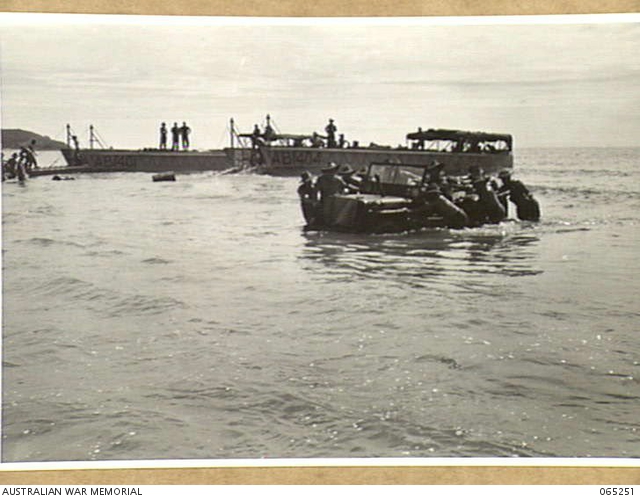 PORT DOUGLAS, QLD. 1944-03-17. A JEEP WHICH STALLED IN DEEP WATER AFTER ...