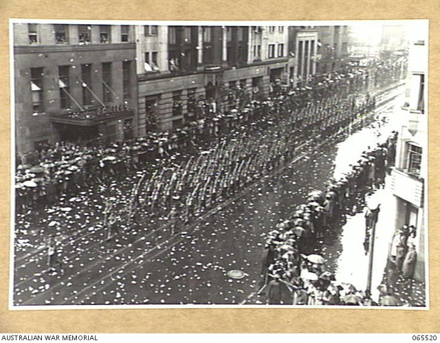 SYDNEY, NSW. 1944-04-14. TROOPS OF THE 7TH DIVISION, MARCHING ALONG ...