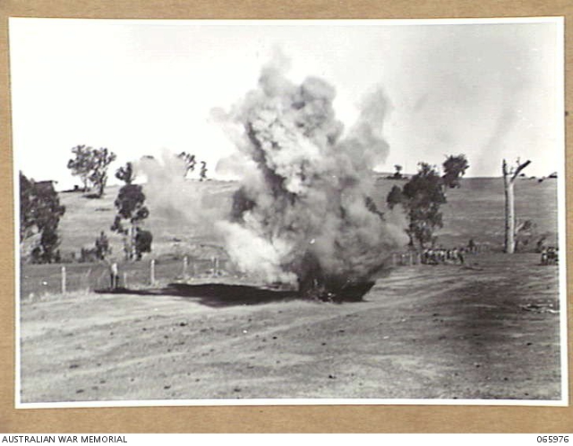 COWRA, NSW. 1944-04-20. LAND MINE EXPLOSION BEING DEMONSTRATED AT THE ...