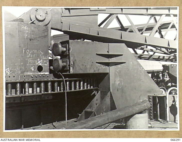 SYDNEY, NSW. 1944-05-10. SLEWING MECHANISM STOP OF AN 80 TON FLOATING ...