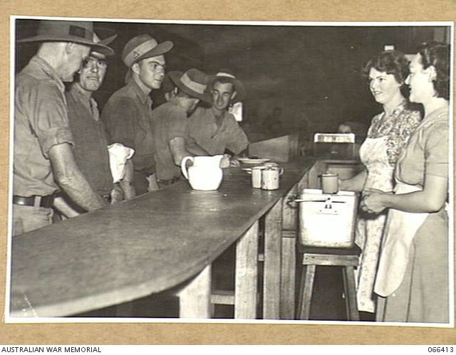 ATHERTON, QLD. 1944-05-11. TROOPS ORDERING MEALS IN BUFFET STYLE AT THE ...