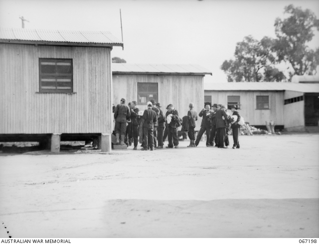 COWRA, NSW. 1944-07-01. JAPANESE PRISONERS OF WAR ATTENDING THE CAMP ...